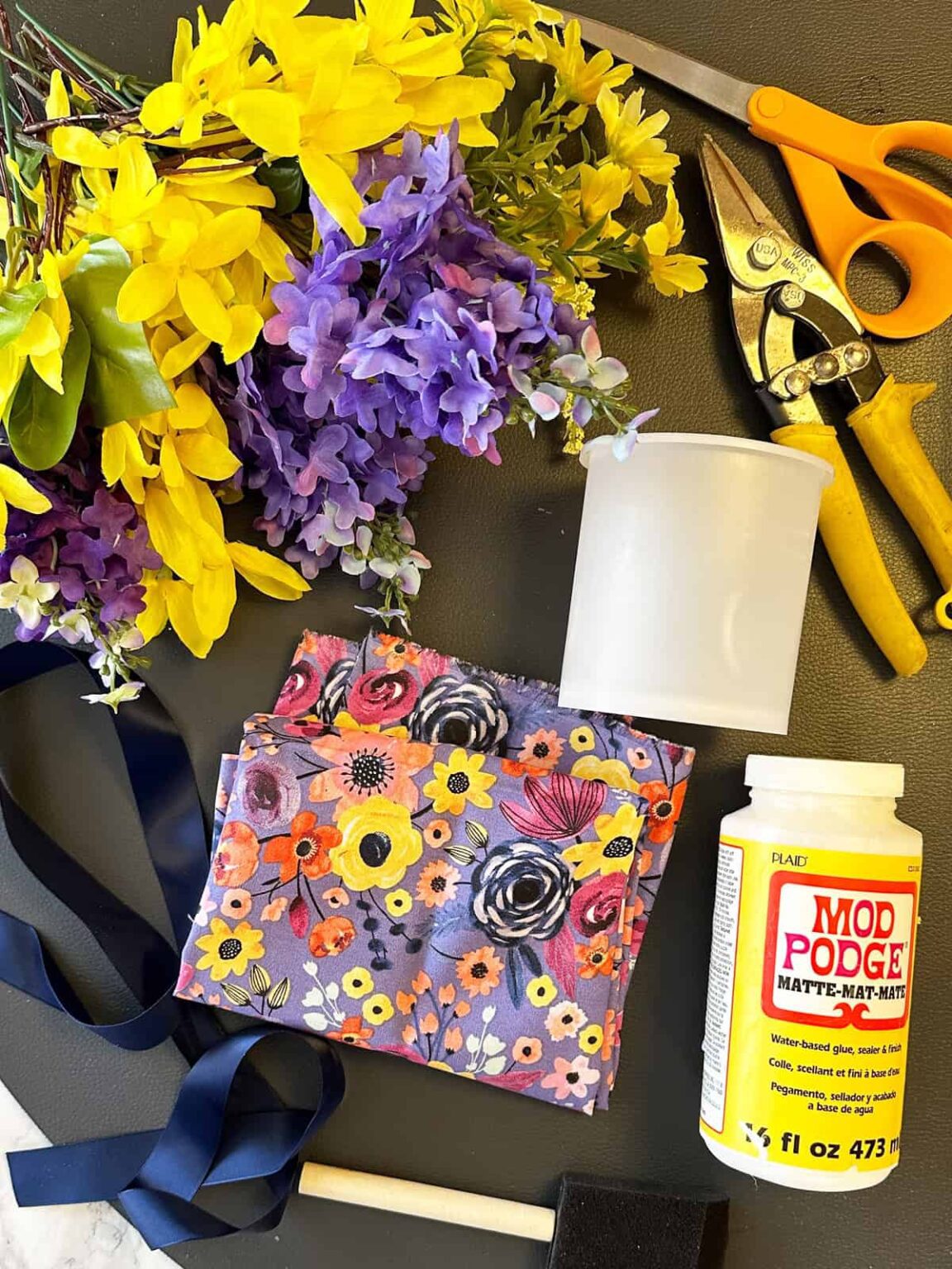 From a Used Cake Frosting Container to a Flower Pot